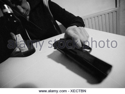 The gun on the table Stock Photo: 132713180 - Alamy