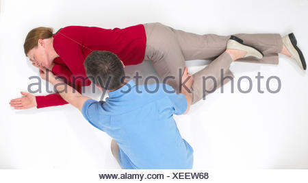 First aid, step by step guide to putting someone in recovery position ...