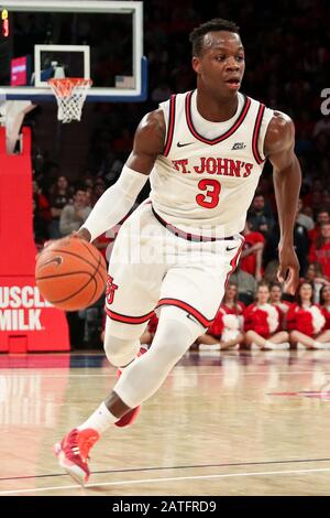 St. John's guard Rasheem Dunn, top, drives to the basket against DePaul ...