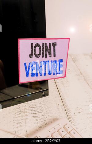 Konzeptionelle Handschrift zeigt Joint Venture. Konzept, das eine ...