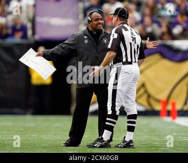 Head linesman Jerry Bergman (91), back judge Rich Martinez (39), field ...