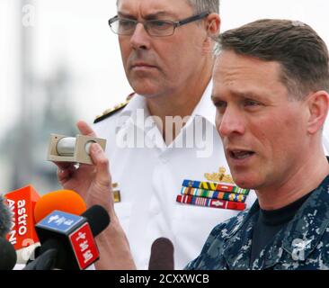 U.S. Navy captain Mark Matthews, right, Royal Australian Navy commodore ...
