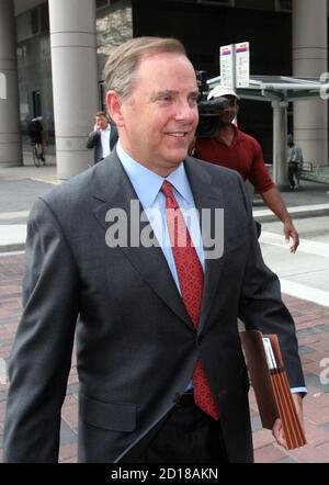 Former Enron executive Andrew Fastow, left, leaves the federal court in ...