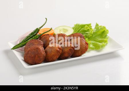 Fotografie mit traditionellen Speisen von Shami Kabab. Jali kabab im ...