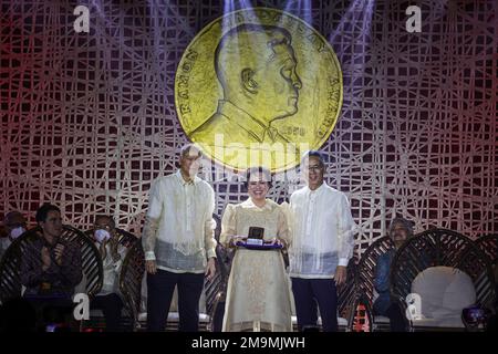 Sotheara Chhim from Cambodia poses with his award with Aurelio Montinola, right, and Ramon ...
