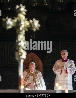 Pope Francis, flanked by his the Master of Pontifical Liturgical ...