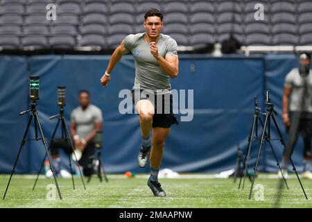Tight end Patrick Murtagh, of Australia, runs the 40-yard dash at the ...