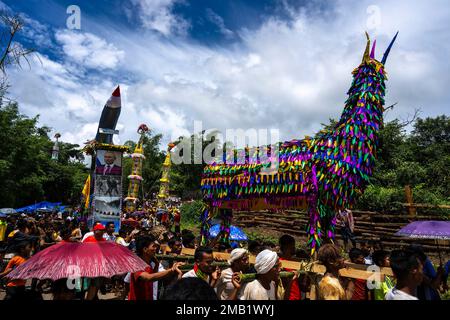 Pnar, or Jaintia, tribals carry 'Rongs' or chariots and dance in muddy ...
