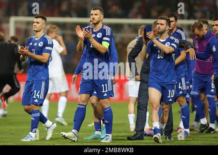 Bosnia's Edin Dzeko, second left, Miralem Pjanic, right, and Amer Gojak ...