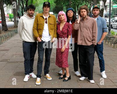 Members of the French band L'Impératrice: Achille Trocellier, clockwise ...
