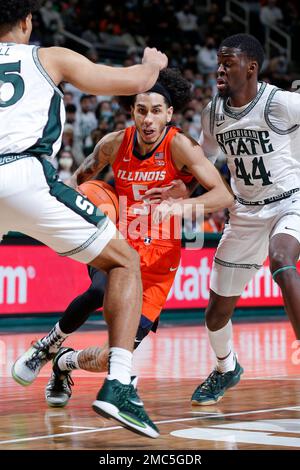 Michigan State's Gabe Brown, right, drives against Oakland's Blake ...