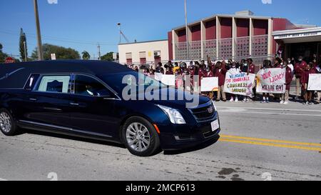 Students at Carrie P. Meek/Westview K-8 Center in Miami, wave at a ...