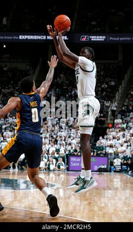 Michigan State's Gabe Brown, right, drives against Oakland's Blake ...