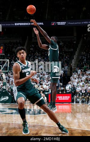 Michigan State's Gabe Brown, right, drives against Oakland's Blake ...