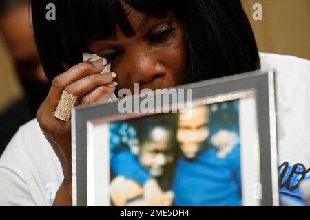 Robyn Williams, sister of Byron Williams, cries during a news ...