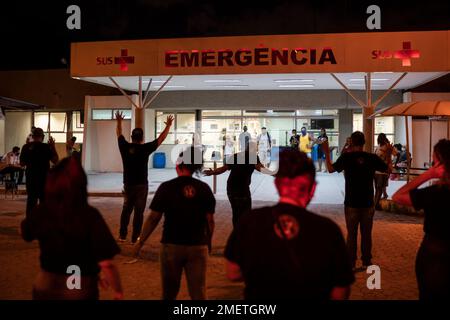 Members of the God's Love Evangelical Church and Rehab Center pray for ...