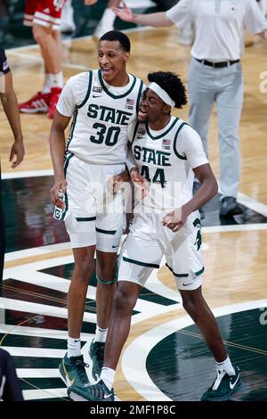Michigan State's Gabe Brown, right, drives against Oakland's Blake ...