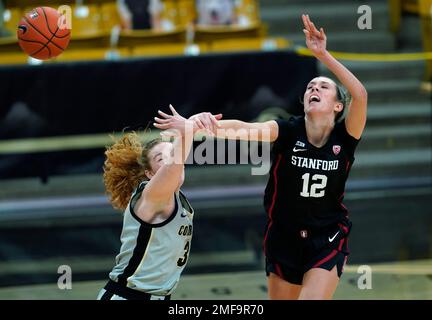 Colorado guard Frida Formann, left, goes up for a shot against Iowa ...