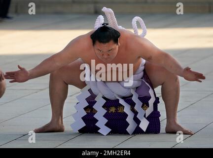 Sumo grand champion Hakuho of Mongolia performs his ring entry form ...