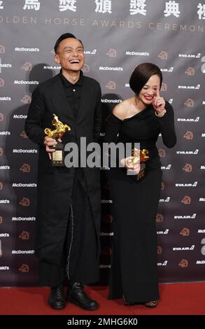 Malaysian actress Yeo Yann-yann, right, and Taiwanese actor Chen Yi-wen hold their awards for ...
