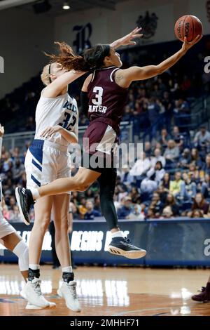 Rice center Nancy Mulkey (32) tries to block a shot by Middle Tennessee ...