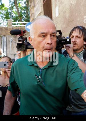 Ethan Elder, father of Finnegan Lee Elder, is hugged by his wife Leah ...