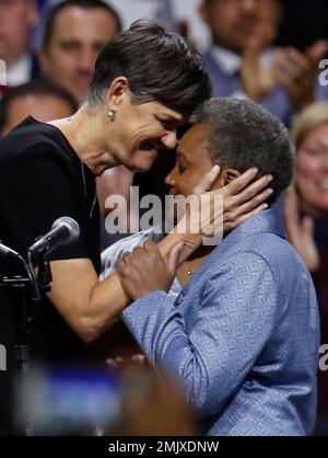 Mayor of Chicago Lori Lightfoot, right, is joined on stage with her ...