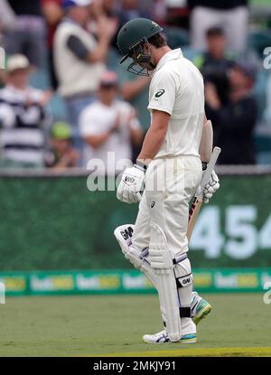 Australia's Travis Head walks off the pitch after being given out ...