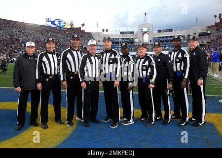 From left, referee Walt Coleman, back judge Tony Steratore, referee ...