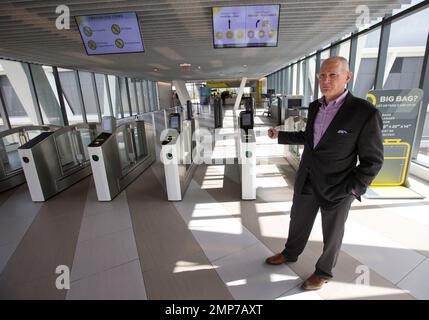 Mike Reininger, Brightline's executive director stands in front of a ...