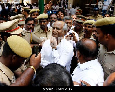 Indian movie superstar Rajinikanth, center, gestures as he addresses a ...