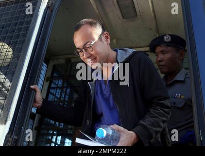 Singaporean journalist Lau Hon Meng leaves after his trial at a court ...