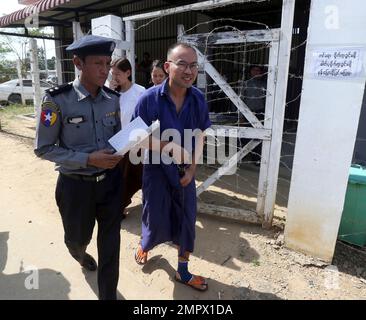 Singaporean journalist Lau Hon Meng leaves after his trial at a court ...