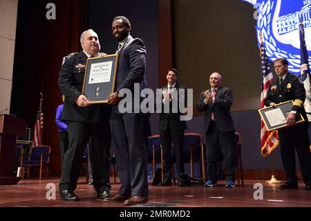 Capitol Hill Police Chief Matthew Verdarosa, left, presents Capitol ...