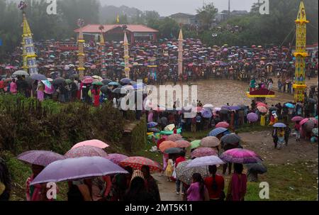 Indian Pnar or Jaintia tribesmen carry 'Rongs' or chariots and dance in ...
