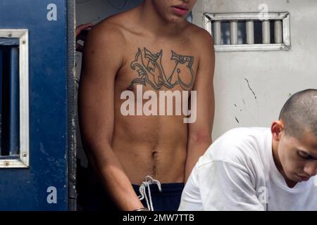 A member of the Barrio 18 gang, who participated in the recent prison ...