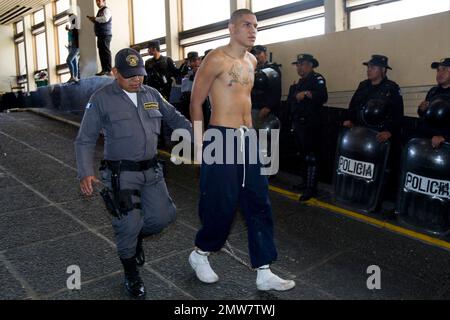 A member of the Barrio 18 gang, who participated in the recent prison ...