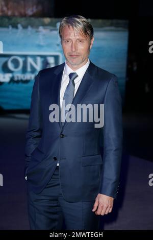 Mads Mikkelsen poses for photographers upon arrival at the premiere of ...