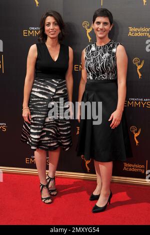 Laura Ricciardi, left, and Moira Demos pose in the press room with the ...