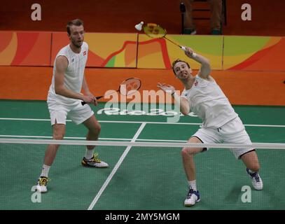 Denmark's Mathias Boe, left, and Carsten Mogensen, right, celebrate ...