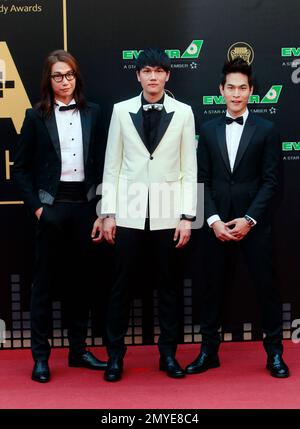 Taiwanese pop group Cosmos People pose for a photo as they arrive for ...