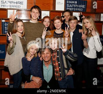 Director and actor Matt Ross, front left, poses with actors, from back ...