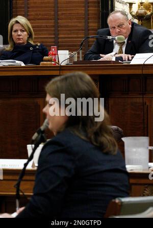 Sen. Melanie Sojourner, R-Natchez, left, asks a question of Sen. John ...