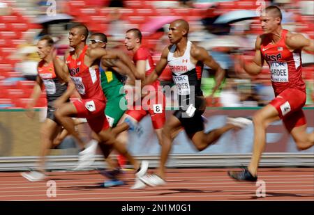 Runner's in a men's 100m decathlon heat from left: United States' Zach ...
