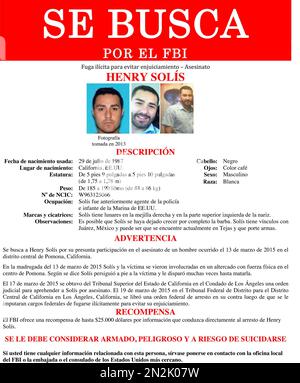 Henry Solis, a former Los Angeles police officer, left, appears with ...