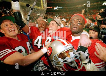 FILE - San Francisco 49ers' Keith Fahnhorst (71) and Joe Montana, rear ...