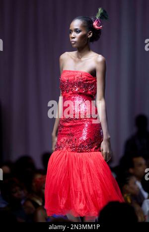 A model wears a creation by Haitian designer Malou Cadet during Fashion ...