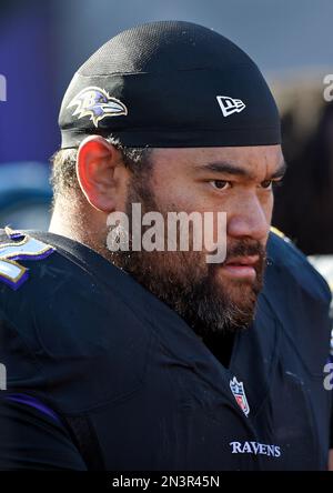 Baltimore Ravens nose tackle Haloti Ngata, right, runs in to score as ...