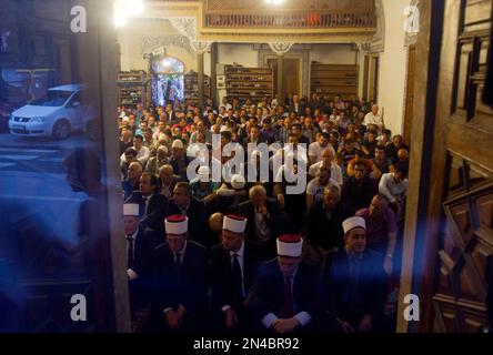 Kosovo Muslims offer Eid al-Fitr prayers outsidethe Sultan Mehmet Fatih grand mosque during the ...
