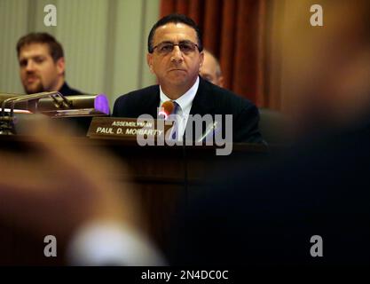 New Jersey Assemblyman Paul Moriarty speaks with his lawyer, John ...